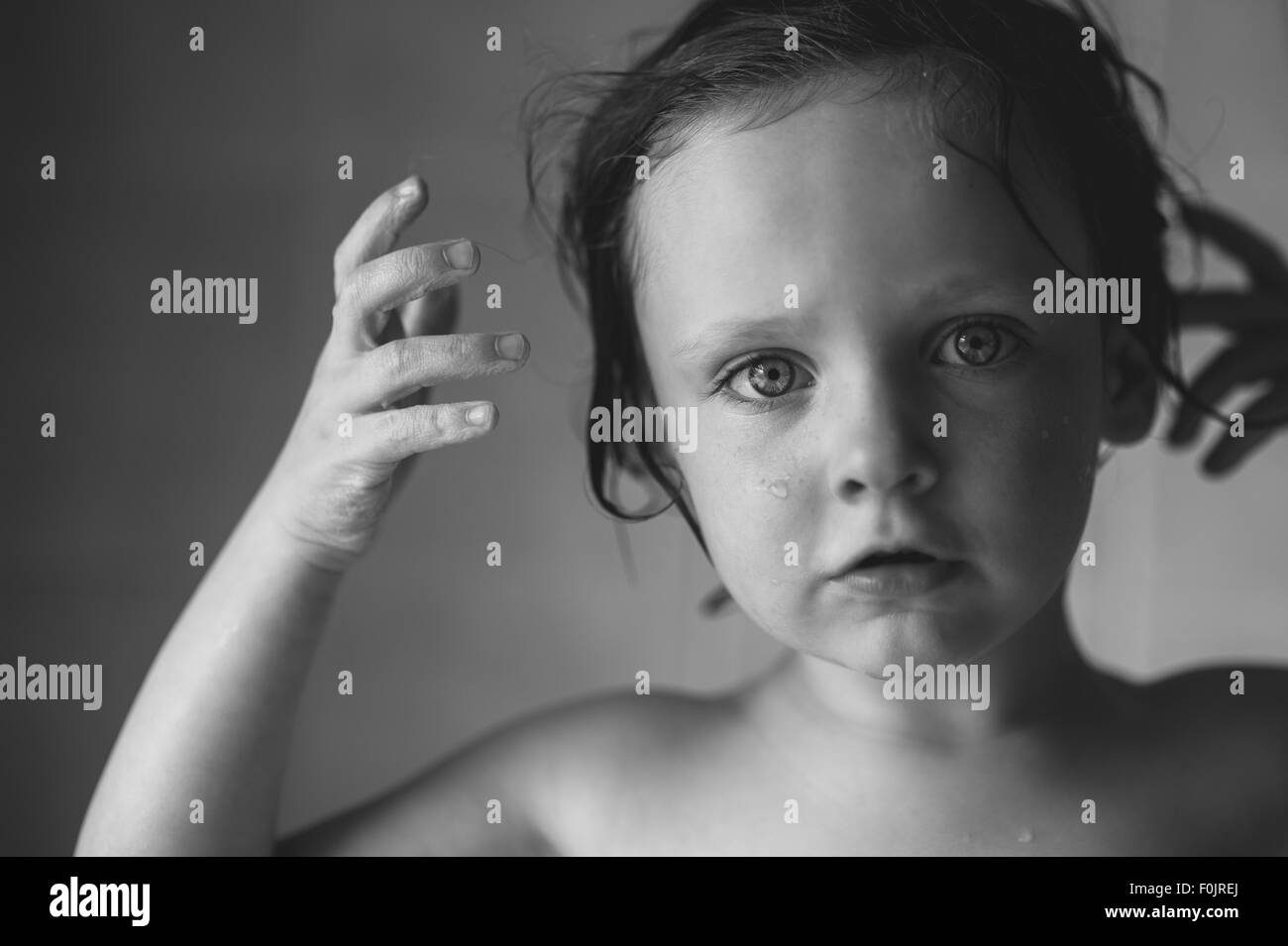 A young girl looking intense Stock Photo - Alamy