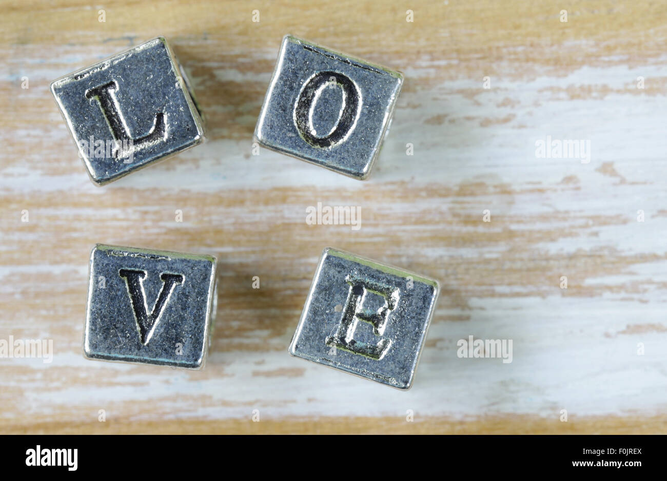 the word "LOVE" written in metal letters Stock Photo - Alamy