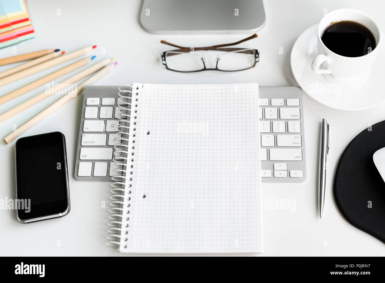 Office workplace with computer on white table. Top view Stock Photo - Alamy