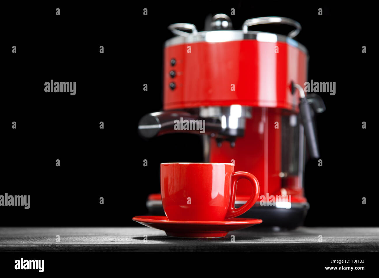 Red coffee machine Stock Photo - Alamy