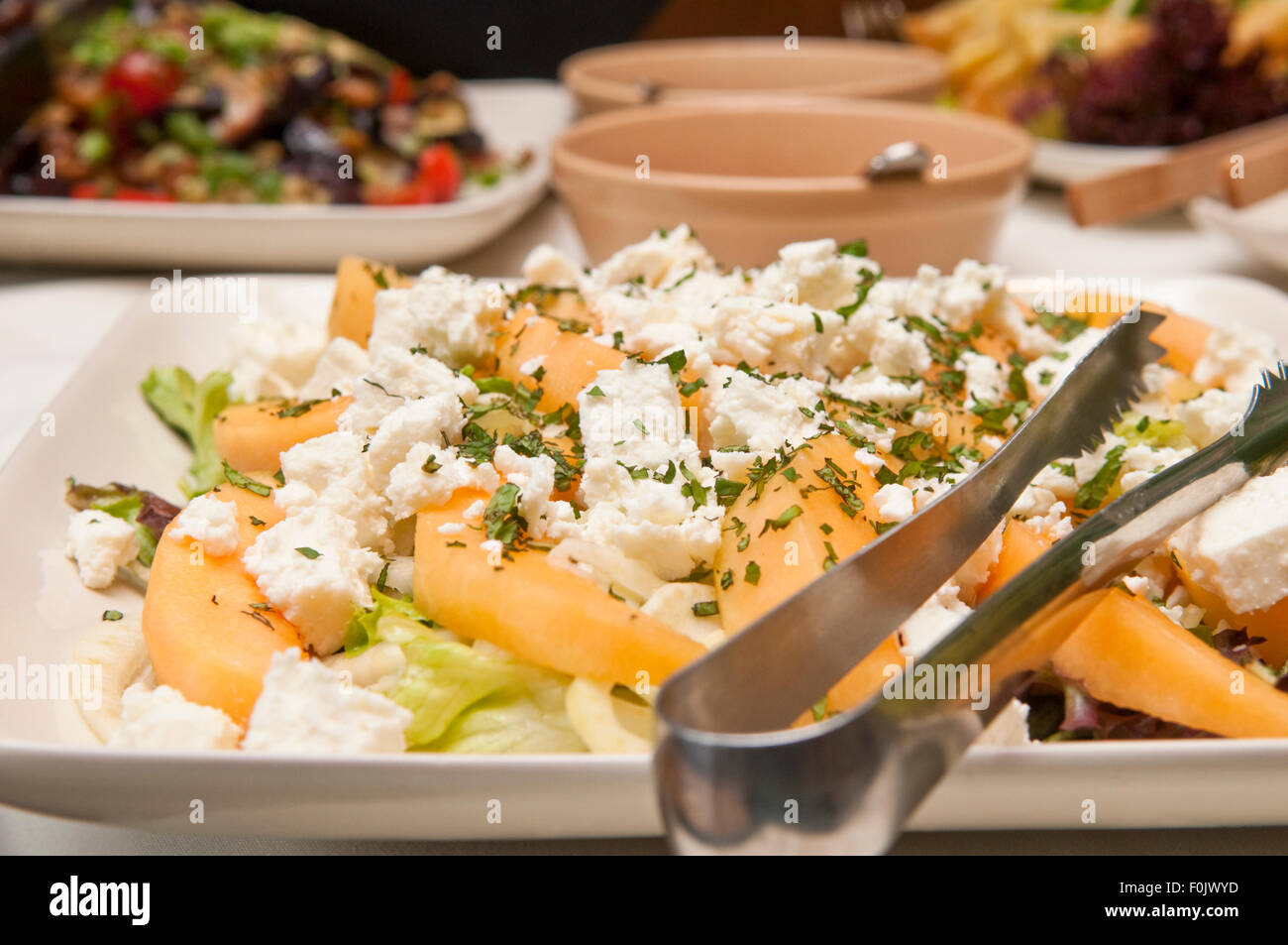 Serving platter and tongs hi-res stock photography and images - Alamy