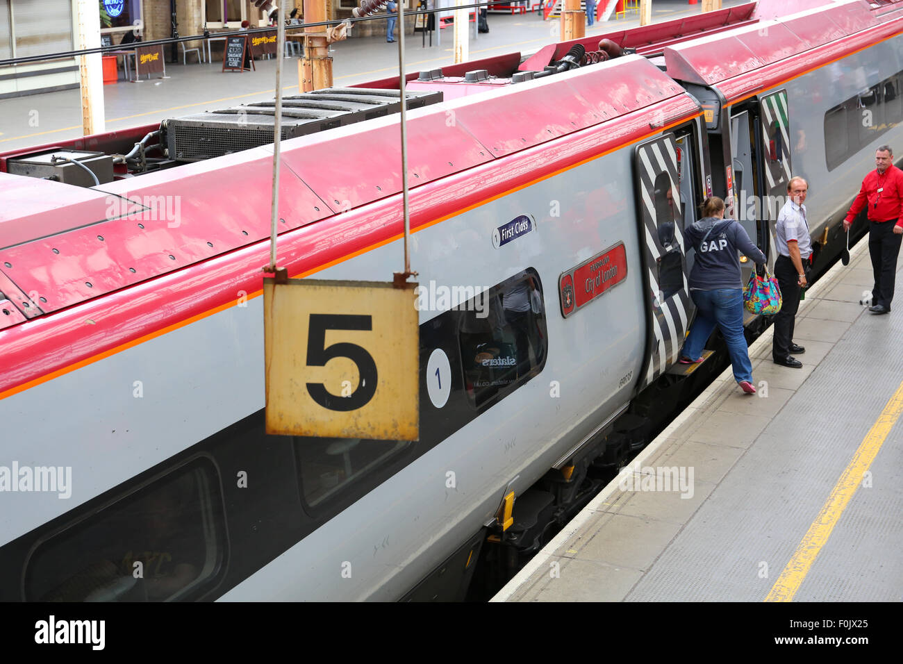 Virgin train arriving at a platform at Crewe railway station, Cheshire ...