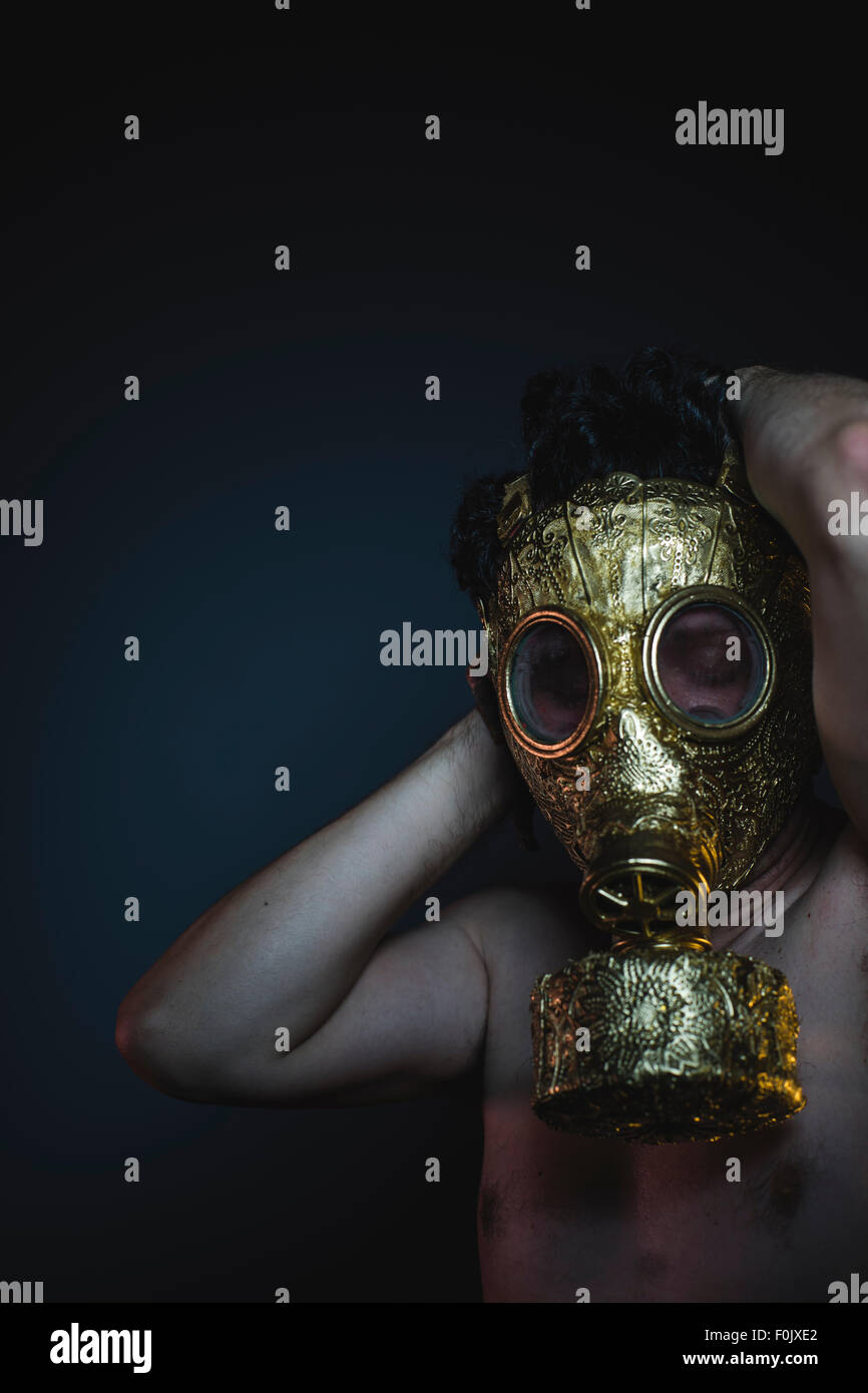 atomic, depression and danger man with golden gas mask Stock Photo - Alamy