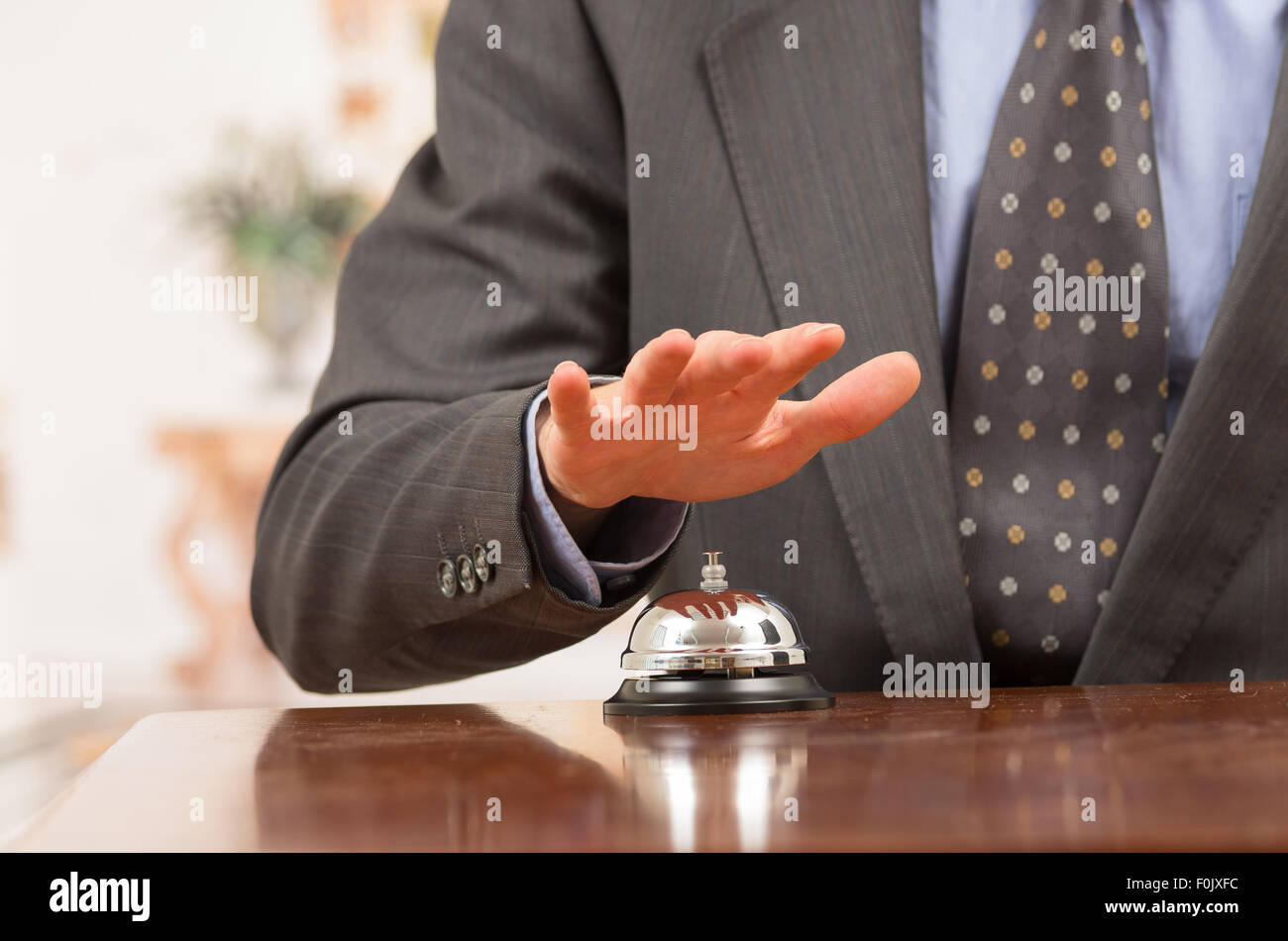 hotel bell at reception desk Stock Photo - Alamy