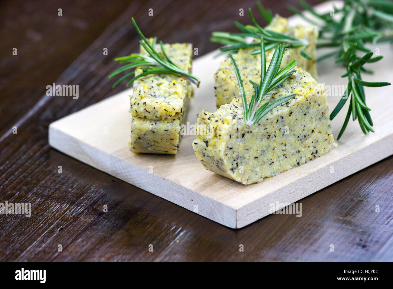 Baked polenta "taragna" (corn and buckwheat flours) with italian cheese ...