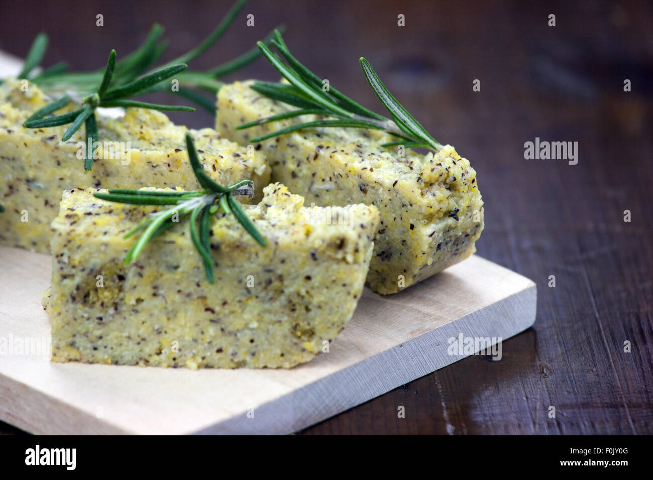 Baked polenta "taragna" (corn and buckwheat flours) with italian cheese ...