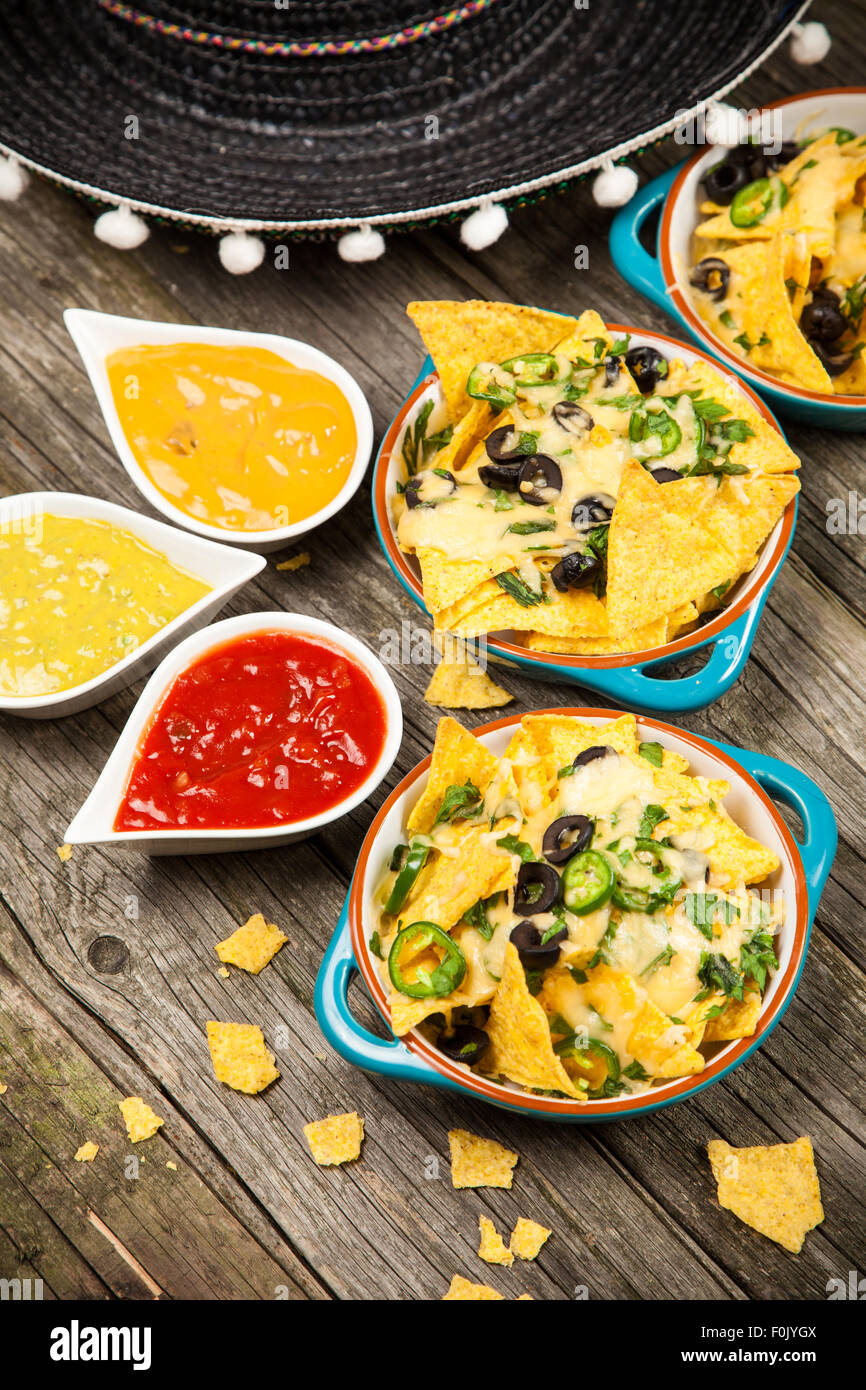 Nachos with melted cheese Stock Photo - Alamy