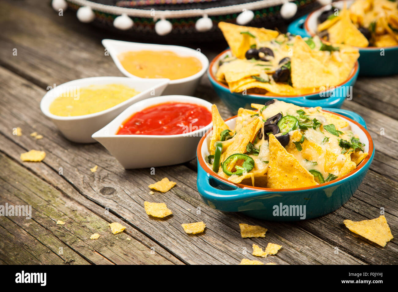Nachos with melted cheese Stock Photo - Alamy