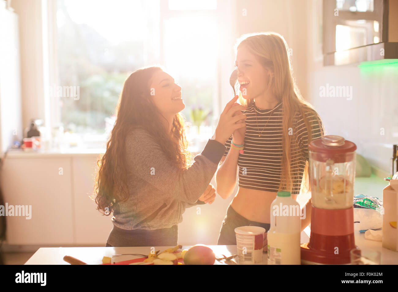 Girl with long hair in kitchen hi-res stock photography and images - Alamy