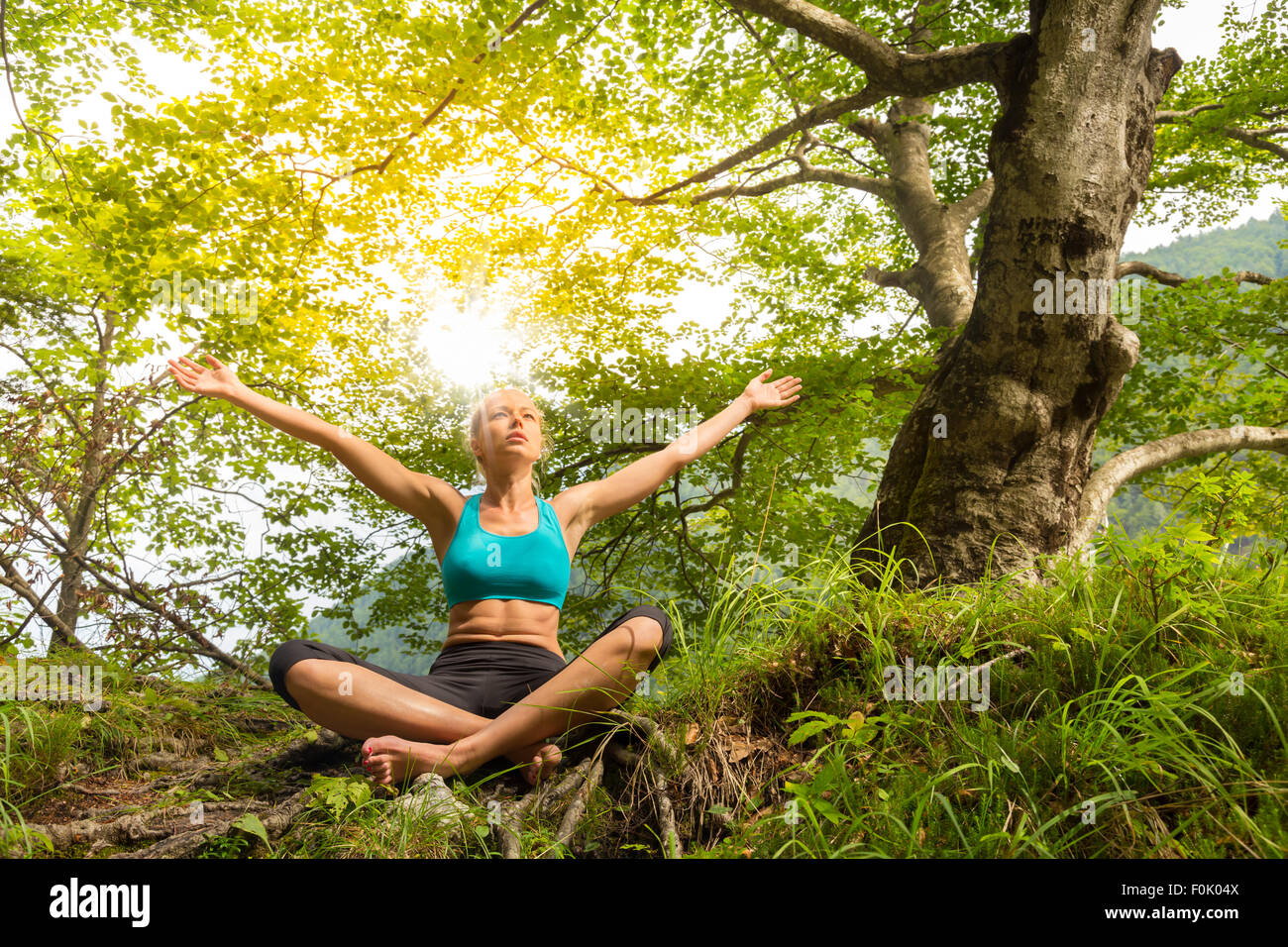 Woman relaxing in beautiful nature Stock Photo - Alamy