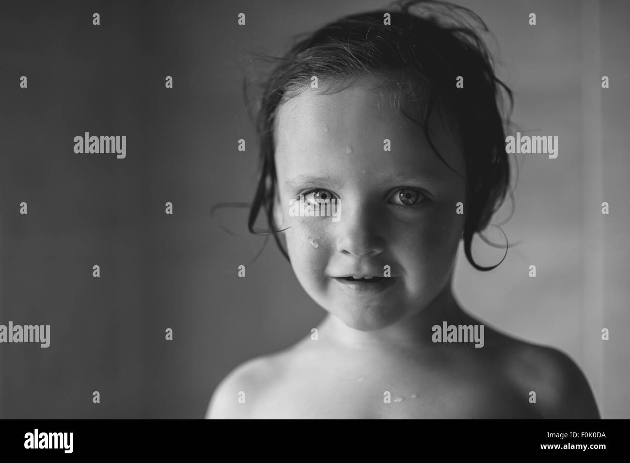 A young girl looking cheeky Stock Photo - Alamy