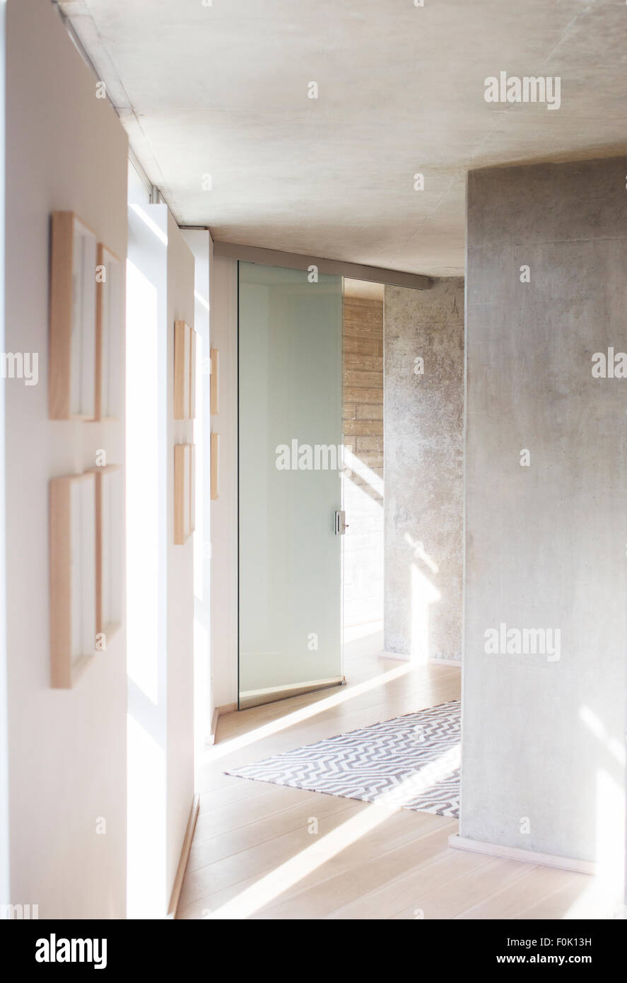 Sunbeams in modern corridor and foyer Stock Photo - Alamy
