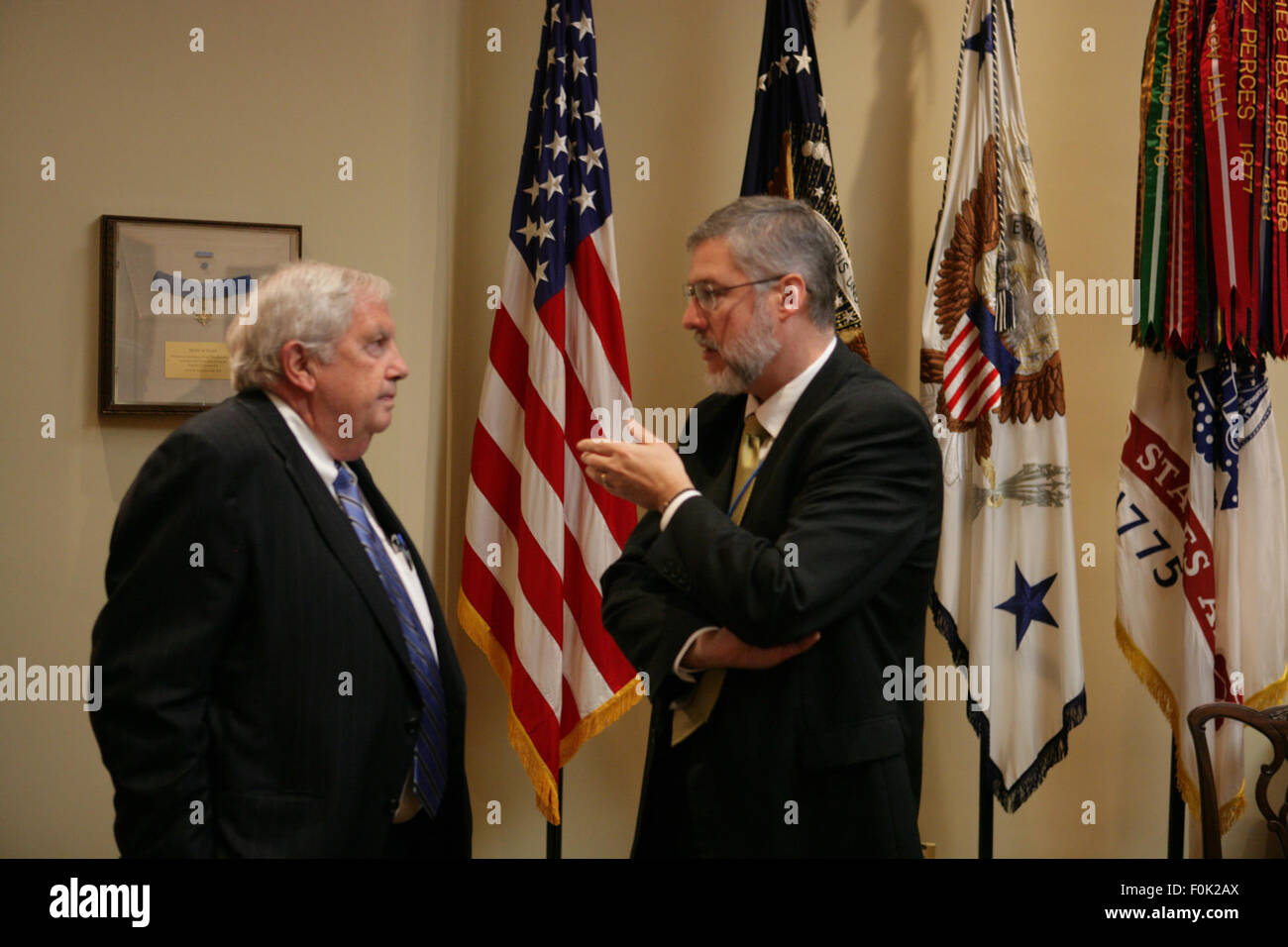 David Addington Talks with Fred Fielding Before Policy Meeting in Stock ...