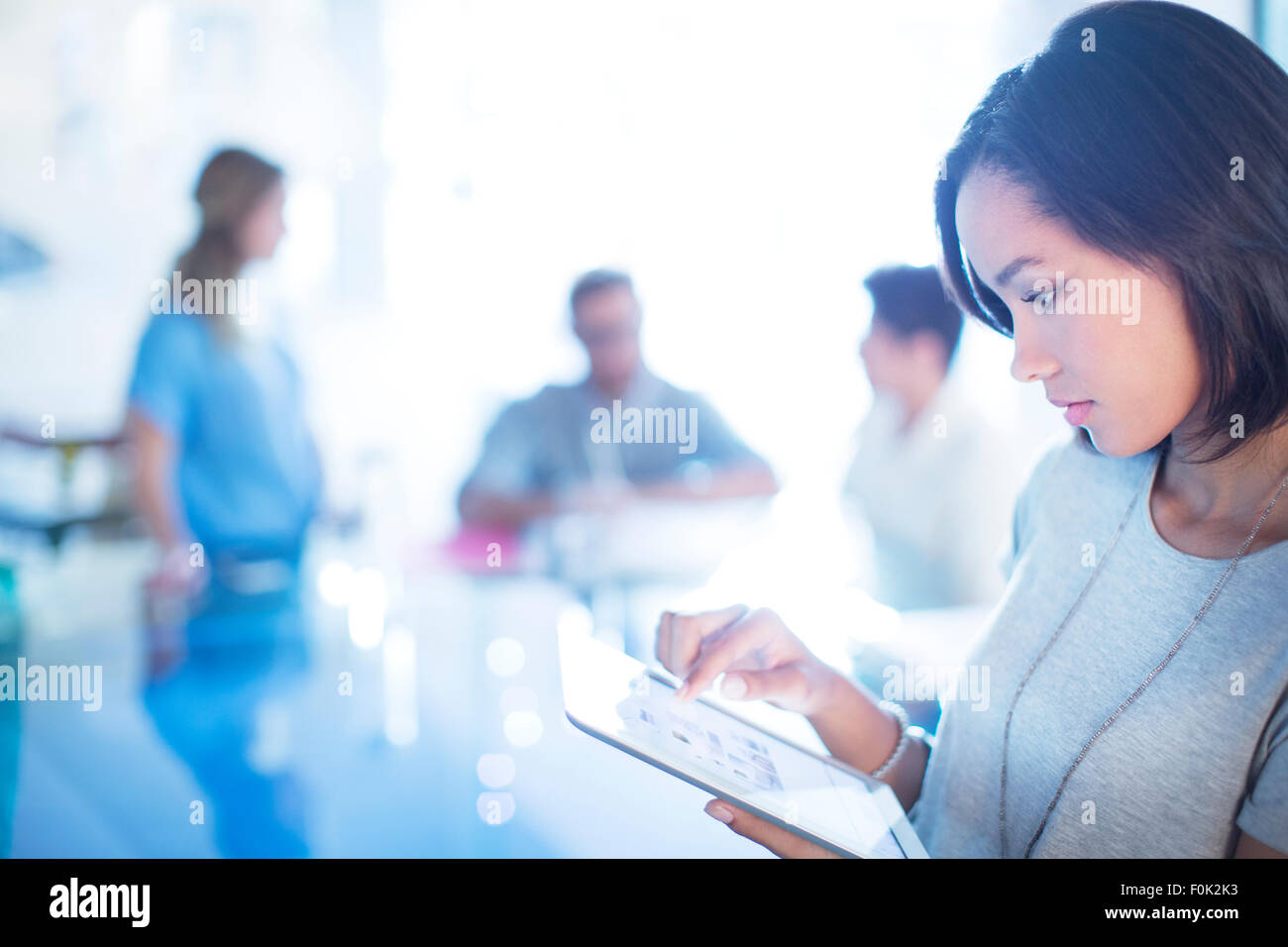 Focused young women using hi-res stock photography and images - Alamy