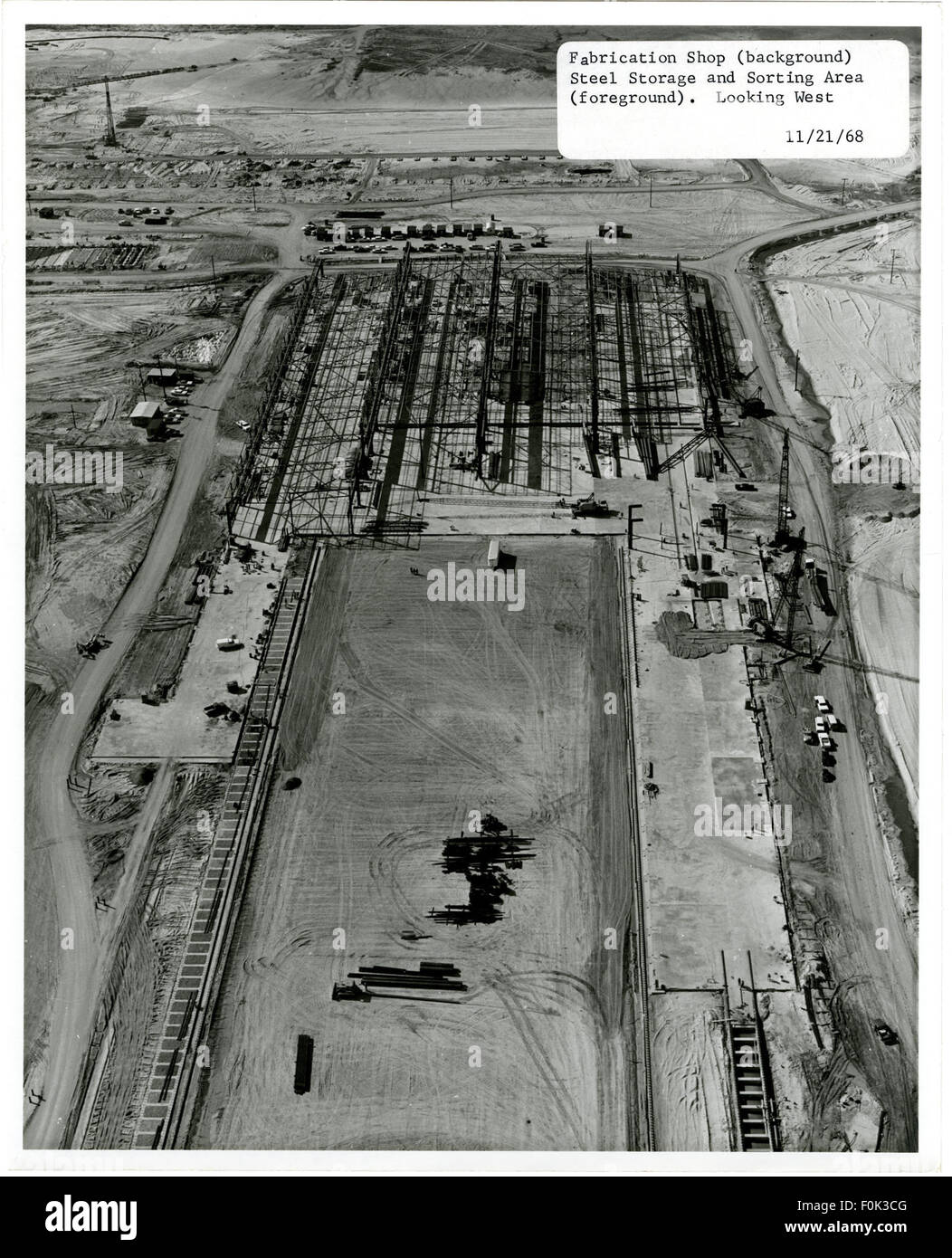 An industrial photograph showing the fabrication shop in the background ...