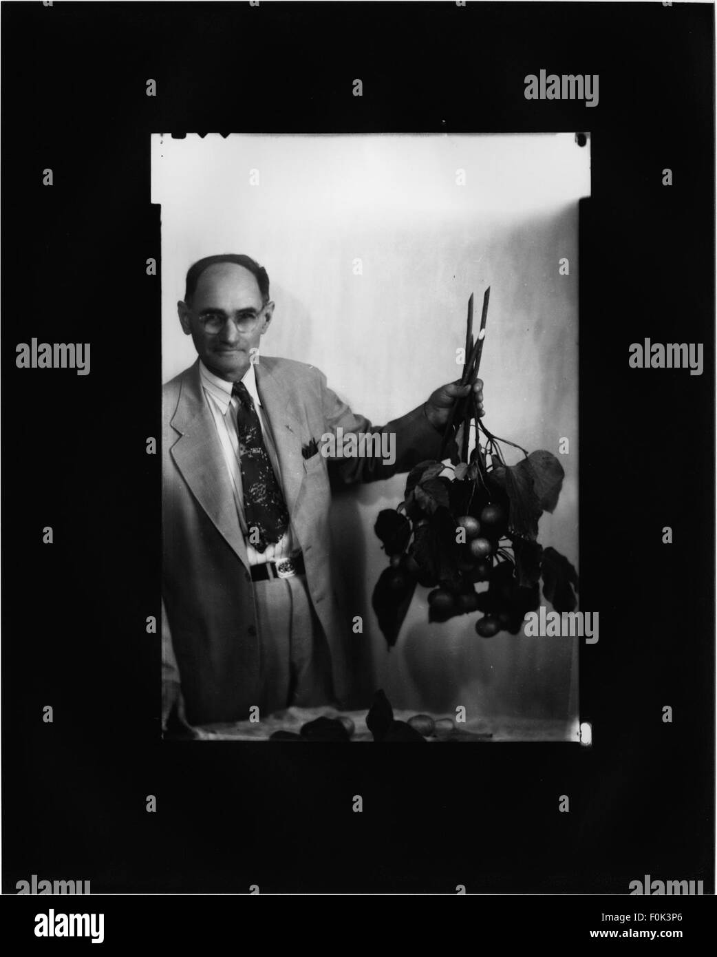 The photograph, taken in 1938, features an individual named Mr. Latimer ...