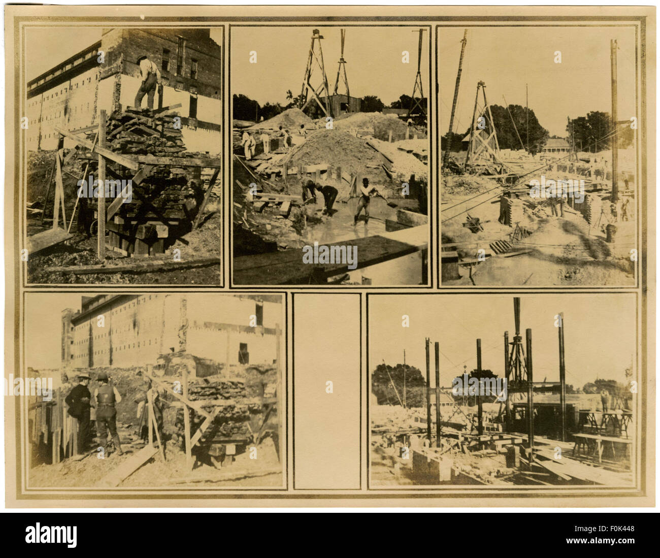 A construction site showing workers engaged in various stages of ...