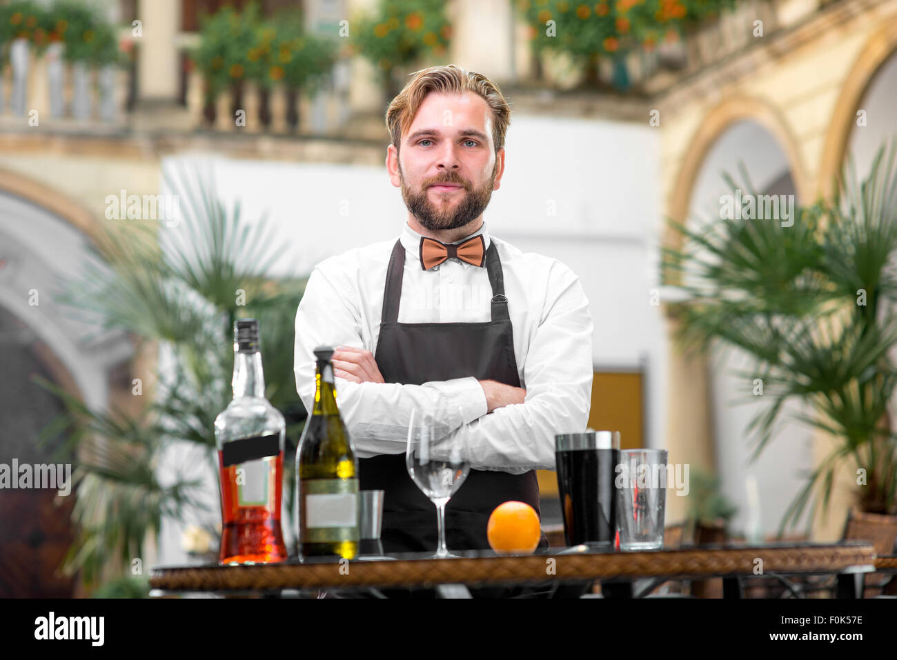 Portrait of barman at the restaurant Stock Photo - Alamy