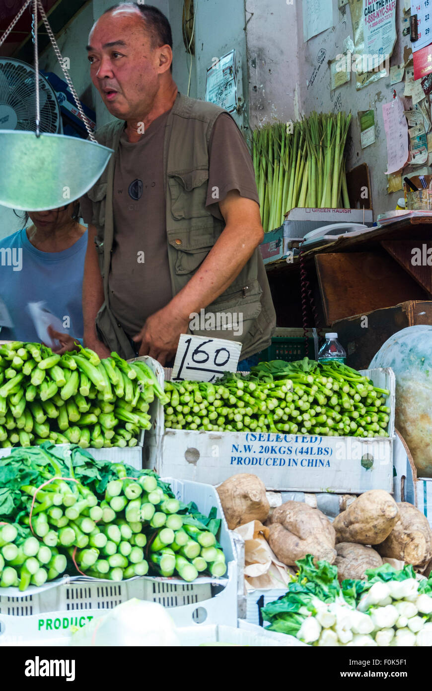 New York City, USA, Chinese Man Working in Local Chinese neighborhood ...