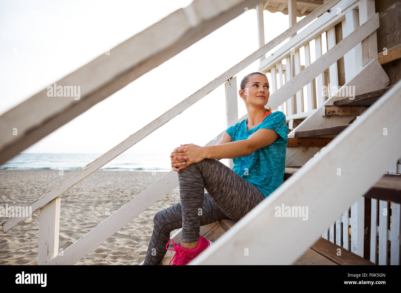 Clasping her knee hi-res stock photography and images - Alamy