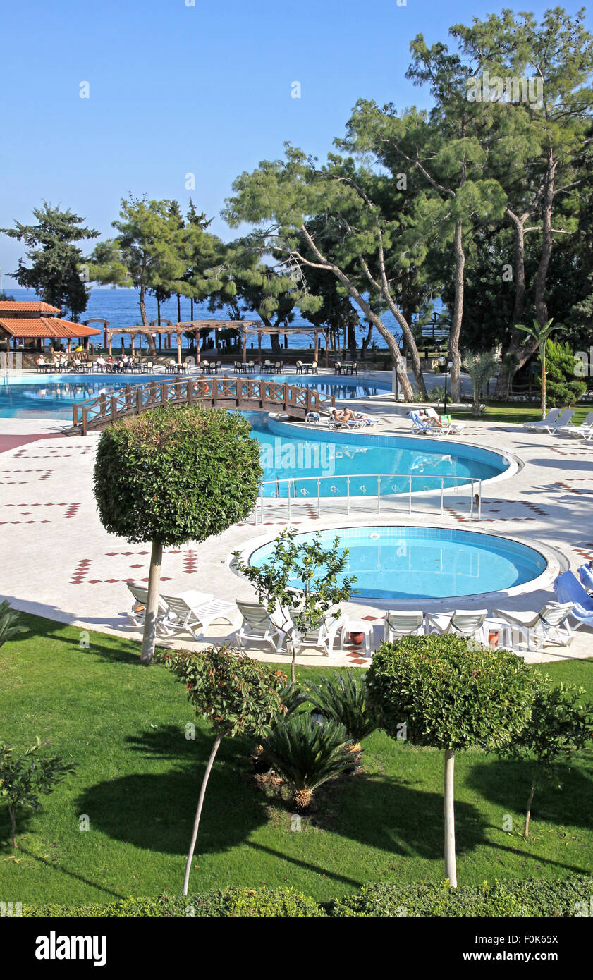 Swimming pool at Mediterranean resort hotel in Turkey Stock Photo - Alamy