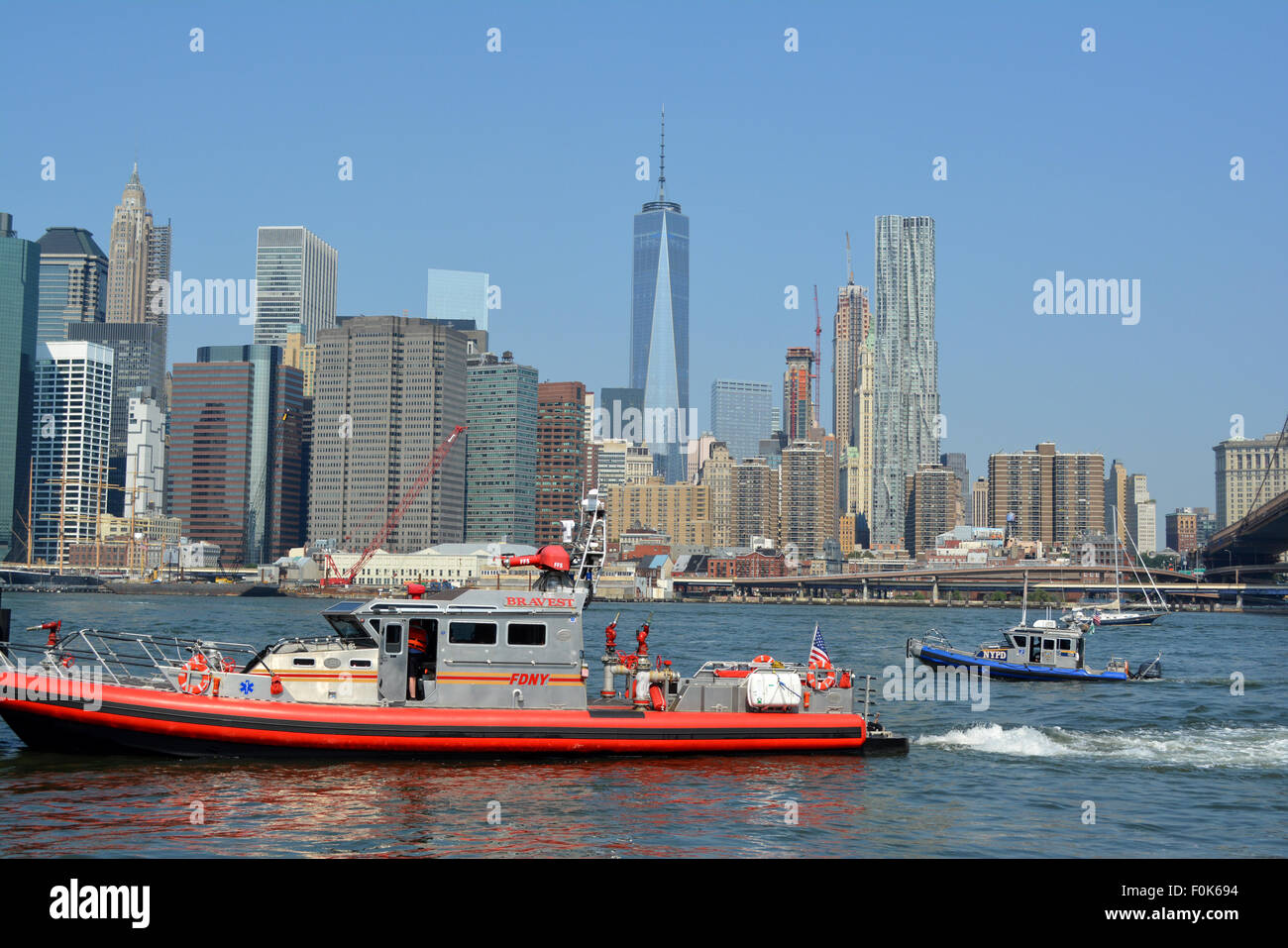 FDNY and NYPD boats responding to an emergency on the East River in New ...