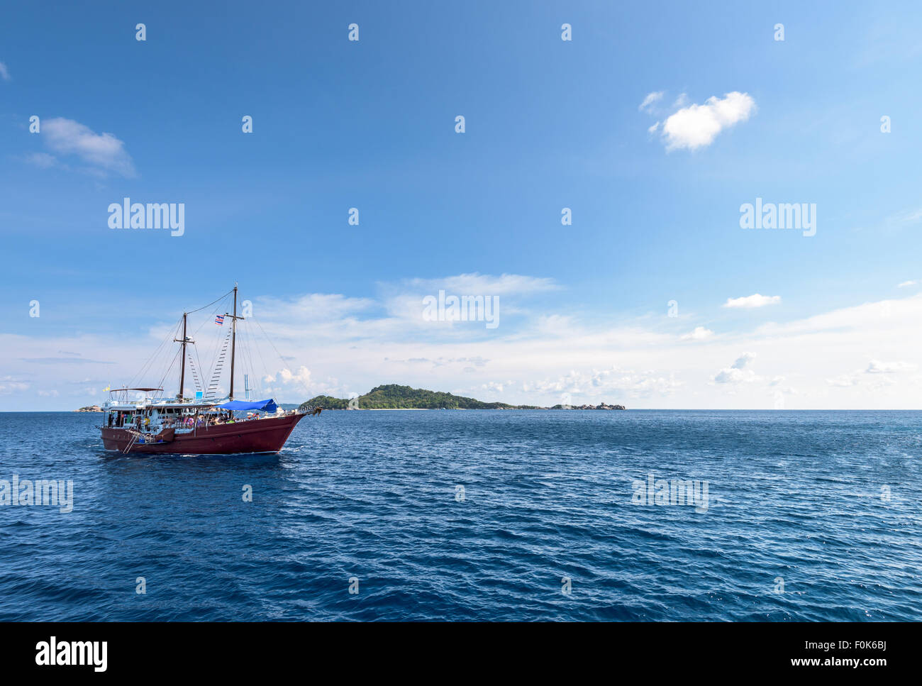 Large passenger ship traveling on the blue water of the Andaman Sea in ...