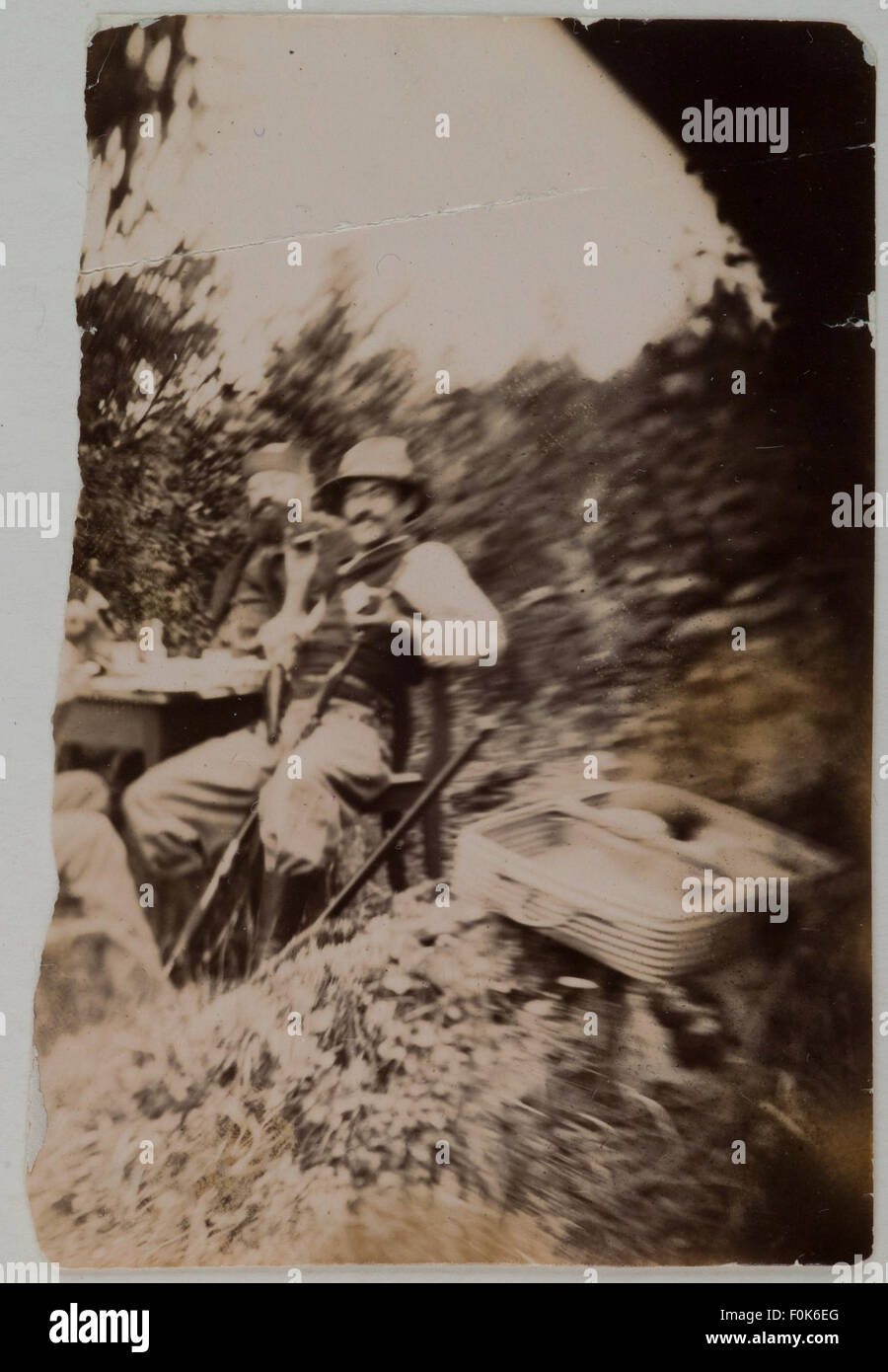 Axel Gallén (only his legs in the picture) G. A. Serlachius and Louis ...