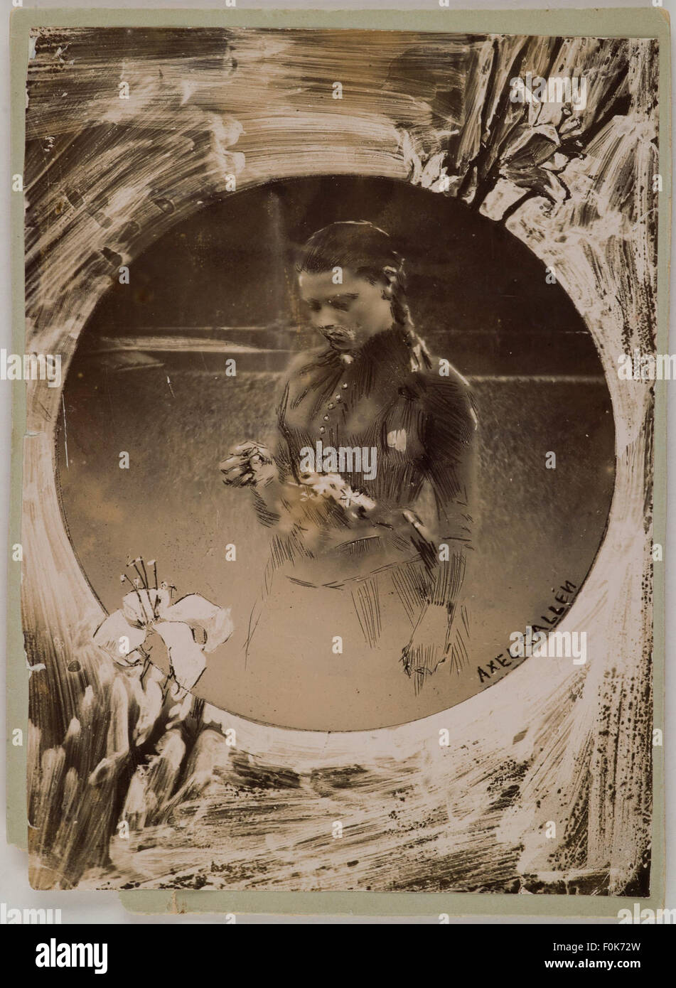 A portrait of Mary Gallén, taken and framed with a floral design by her ...