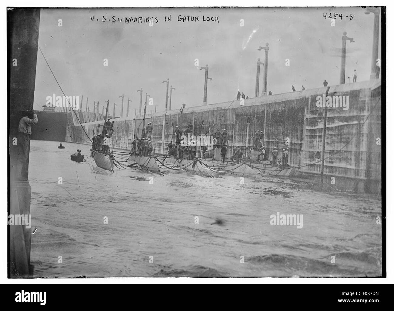 This photograph captures US submarines passing through the Gatun Lock ...