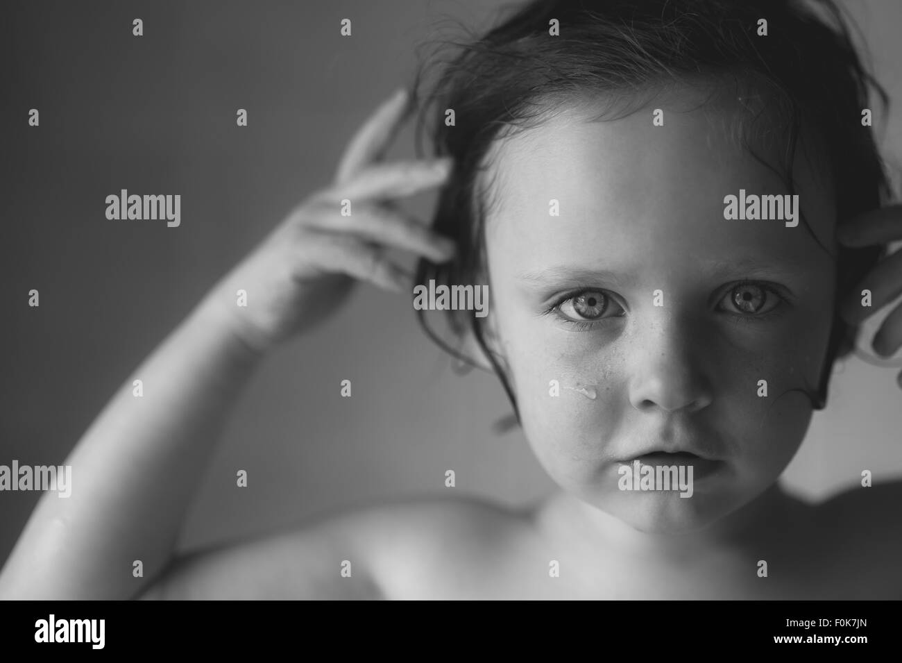 A young girl looking intense Stock Photo - Alamy