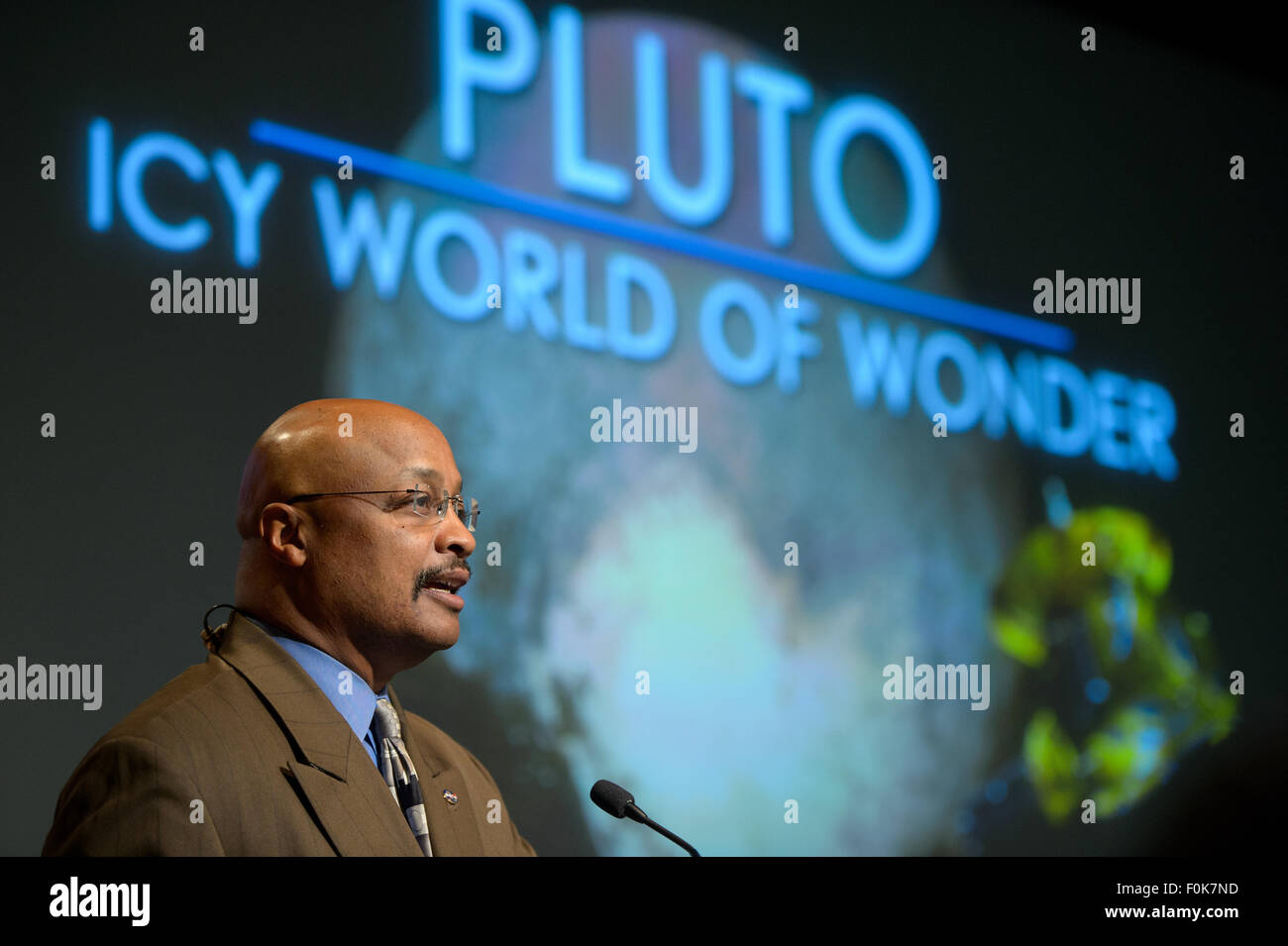 NASA's Dwayne Brown moderates a New Horizons science update, showcasing ...