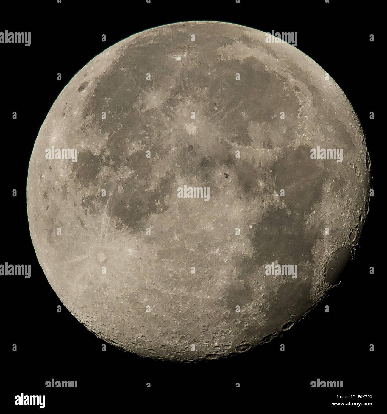 The International Space Station (ISS) transits the moon at five miles ...