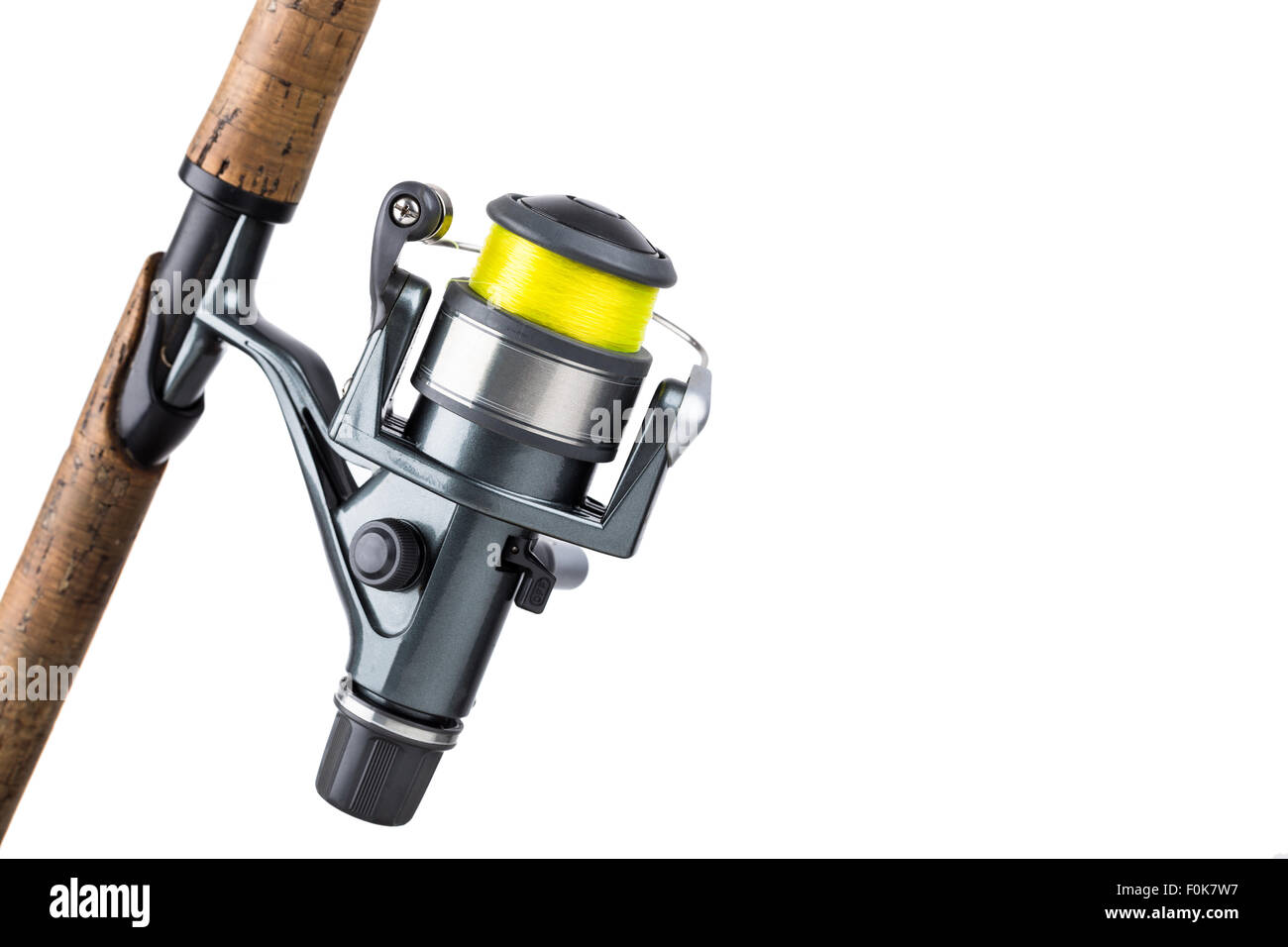 fishing rod and reel with line on white background Stock Photo - Alamy
