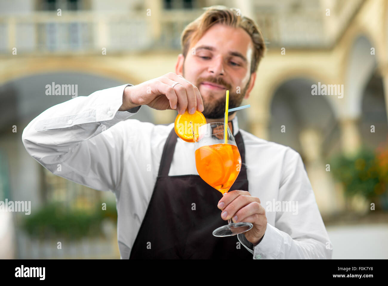 Barman making cocktail Stock Photo - Alamy