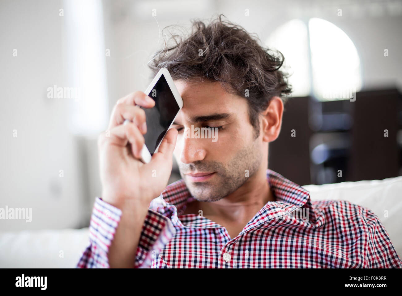 Boring handsome young man Stock Photo - Alamy