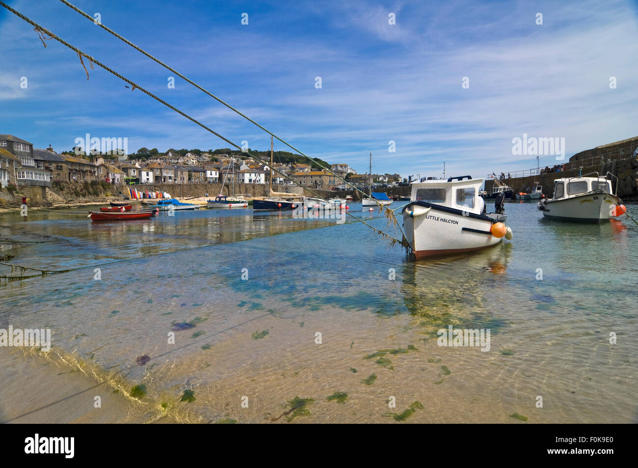 Horizontal view of high tide in Mousehole, Cornwa Stock Photo - Alamy