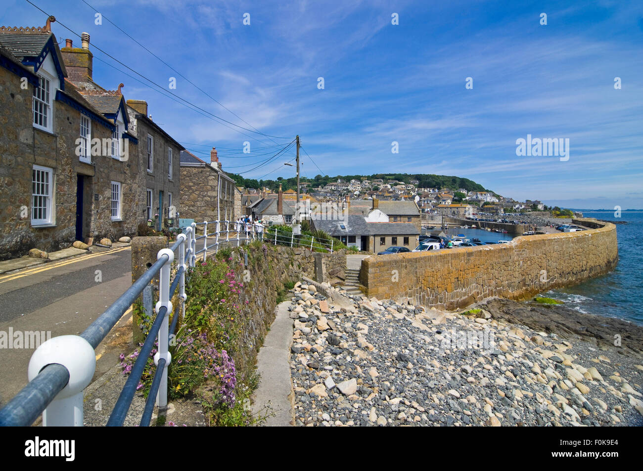 Horizontal street view of Mousehole in Cornwall Stock Photo - Alamy