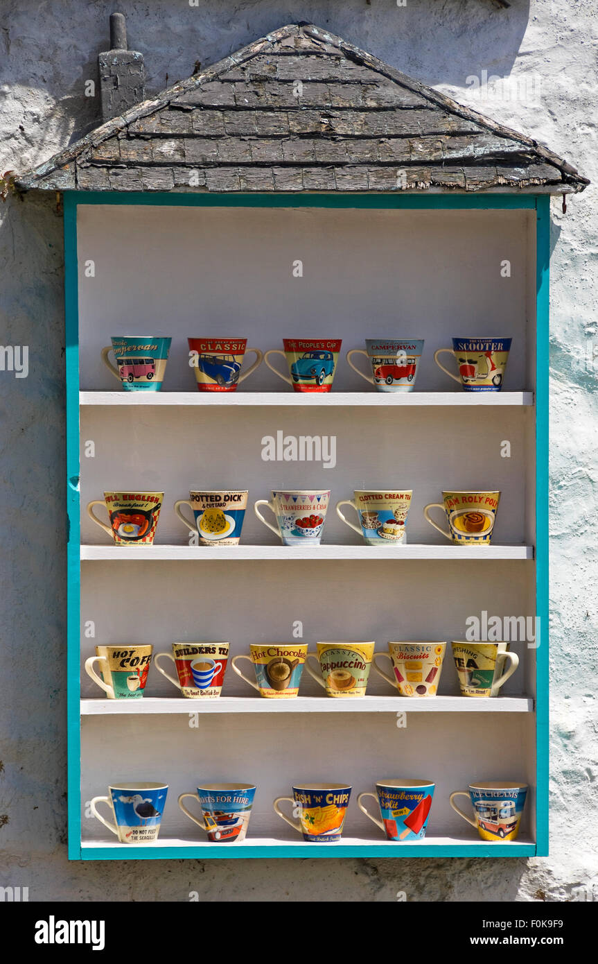 Vertical view of decorated mugs for sale outside a gift shop in ...