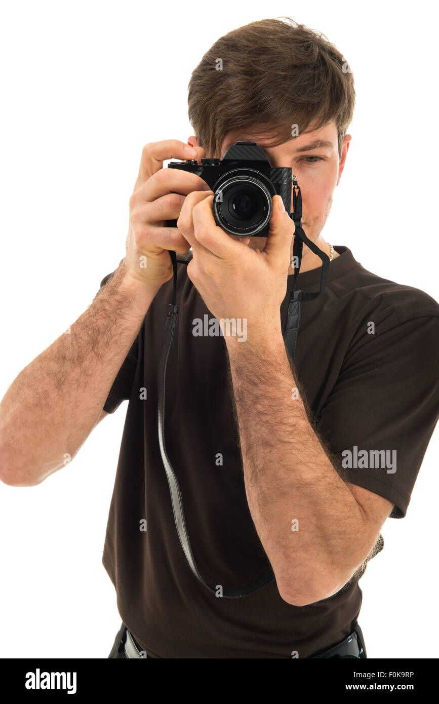Young professional photographer shooting in the studio Stock Photo - Alamy