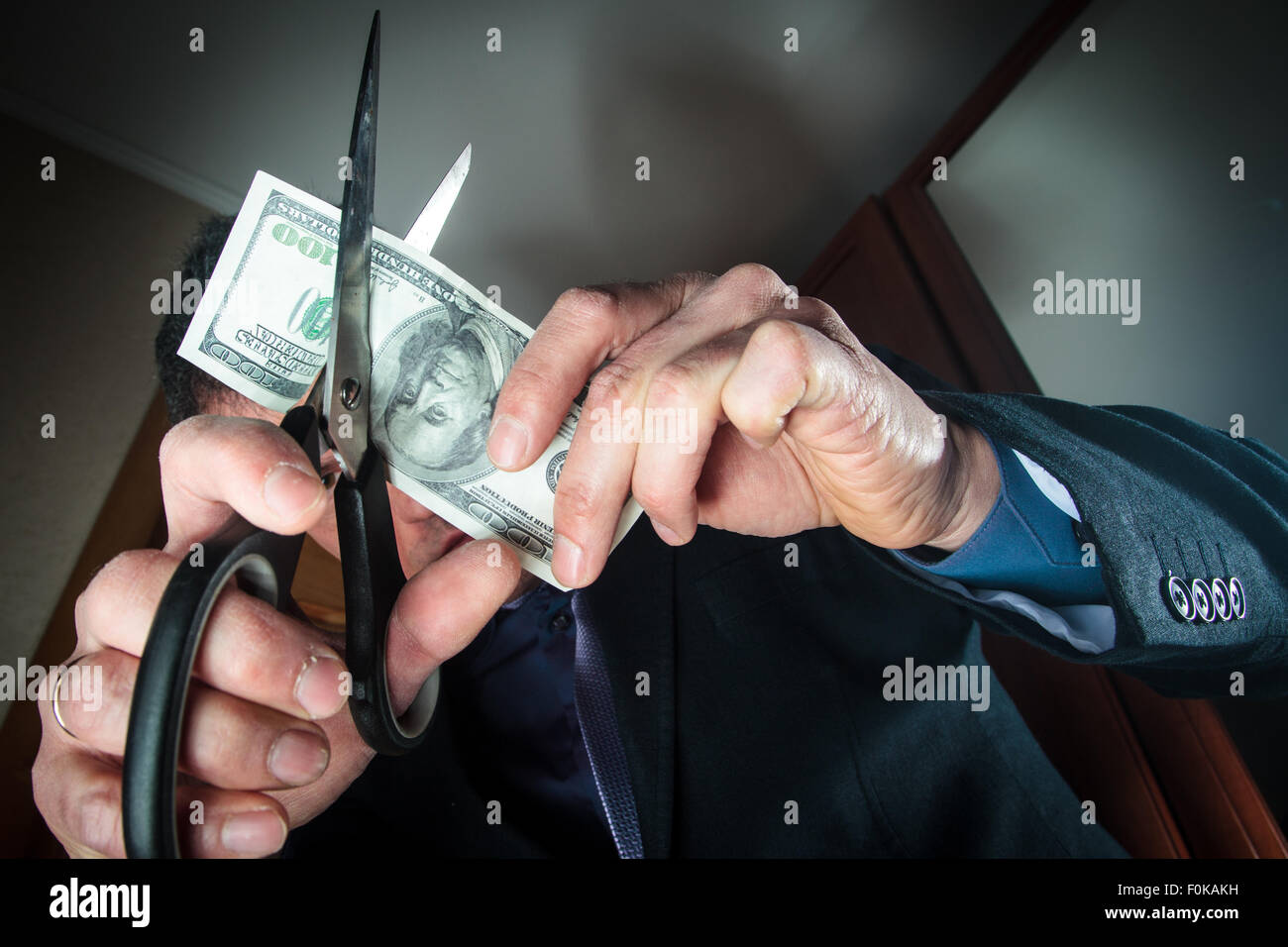 Money cuts hi-res stock photography and images - Alamy