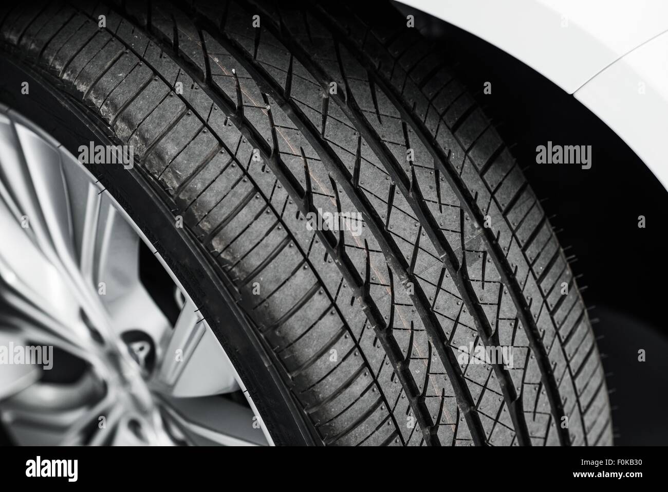 Brand New Car Tire Closeup Photo. Modern Car Tire Stock Photo - Alamy