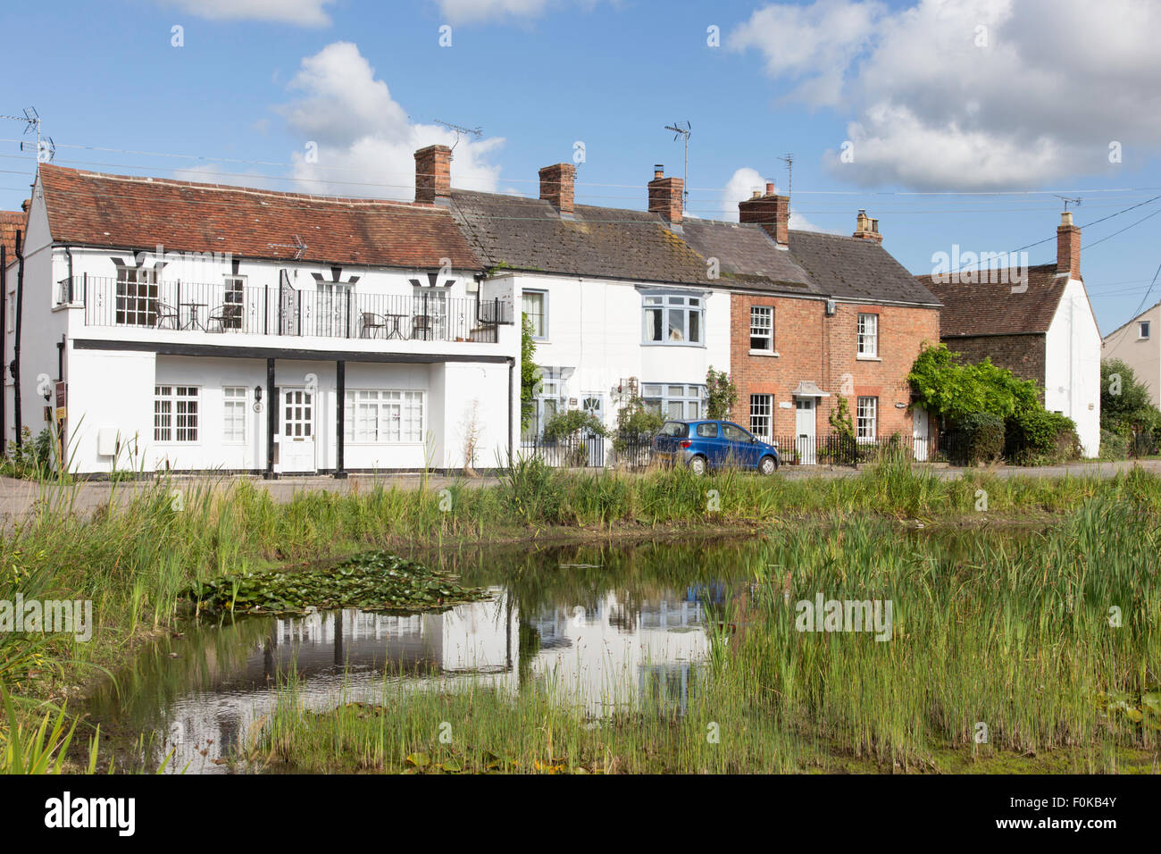 Pond in the village hi-res stock photography and images - Alamy