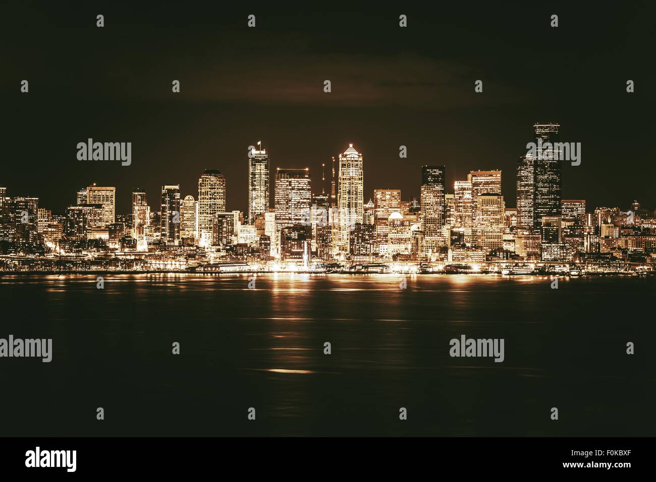 Golden Seattle Skyline at Night. Seattle and the Puget Sound in Golden ...
