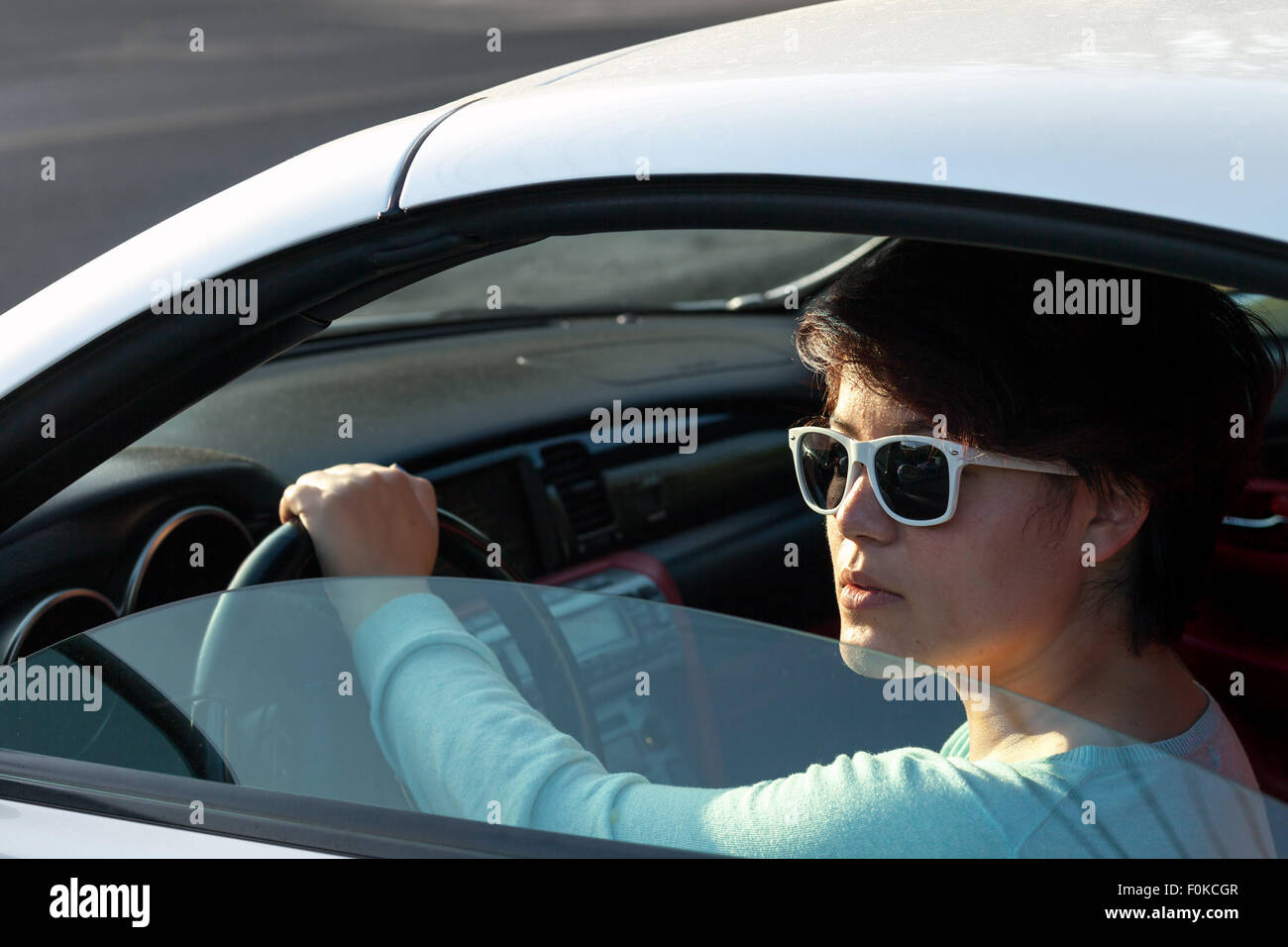 Woman Driving a Sports Car Stock Photo - Alamy