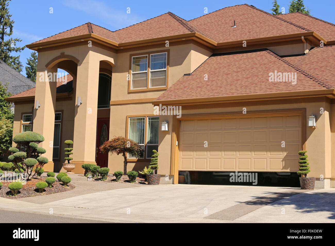 Open garage door in suburban family home Stock Photo - Alamy