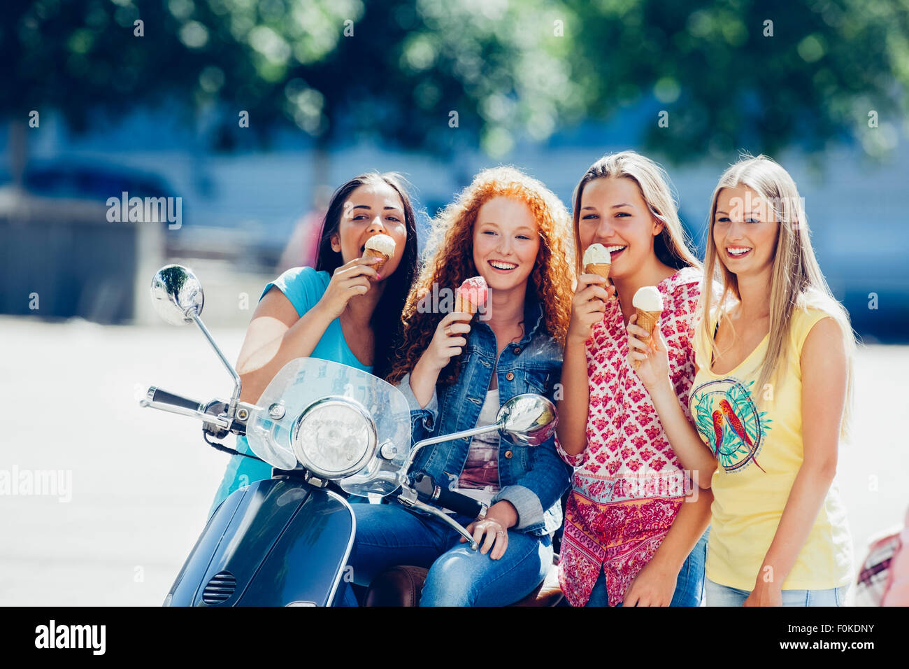 Group picture four friends motor hi-res stock photography and images ...