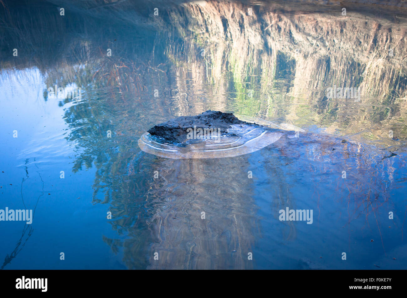 Ice patterns on a frozen pond Stock Photo - Alamy