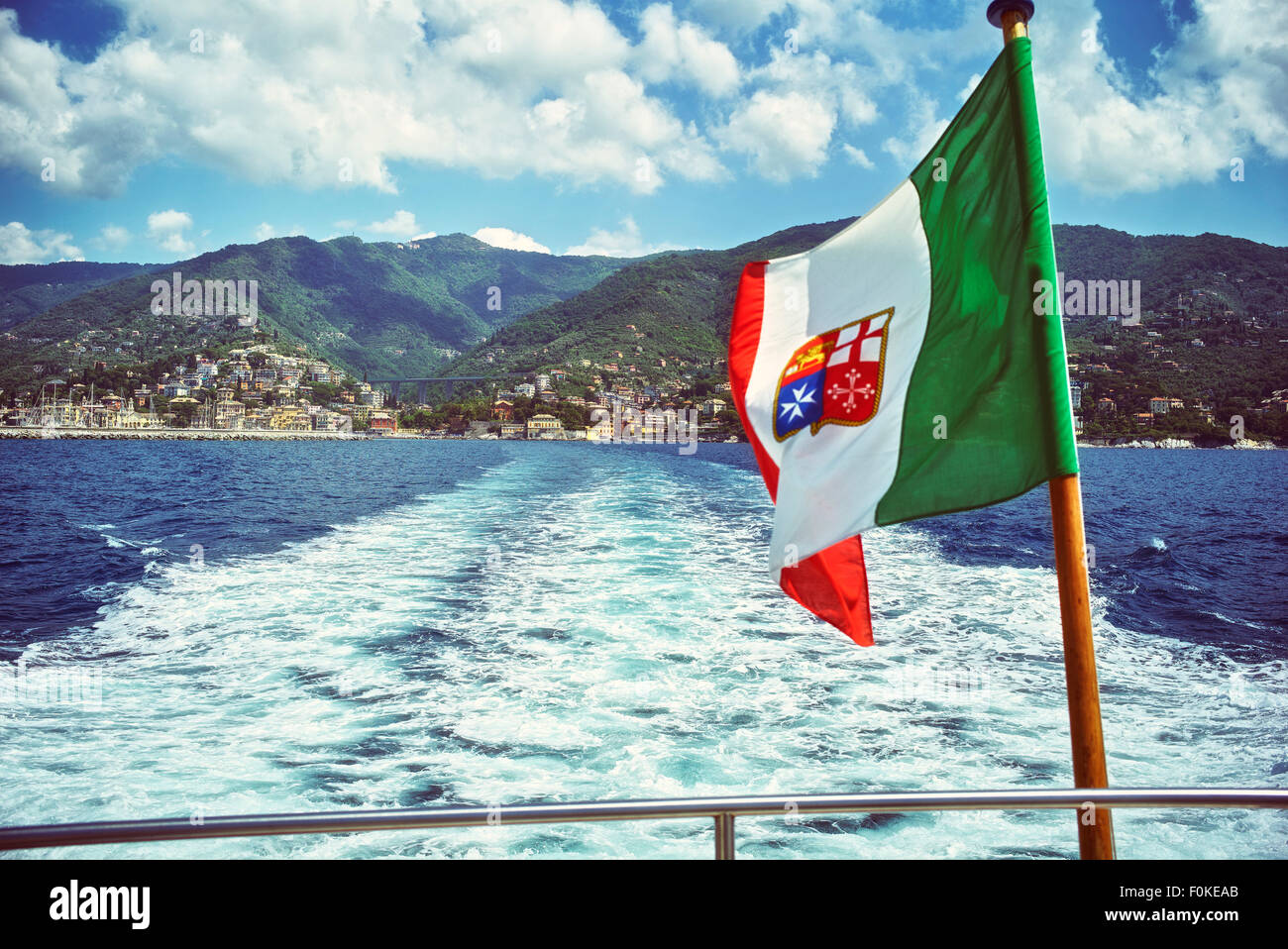 Italy, Liguria, Rapallo, stern of a ship with Genoese flag on the sea ...