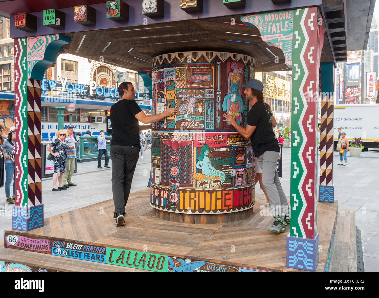 Artists Patrick Miller, left and Patrick McNeil, right, spin "FAILE ...